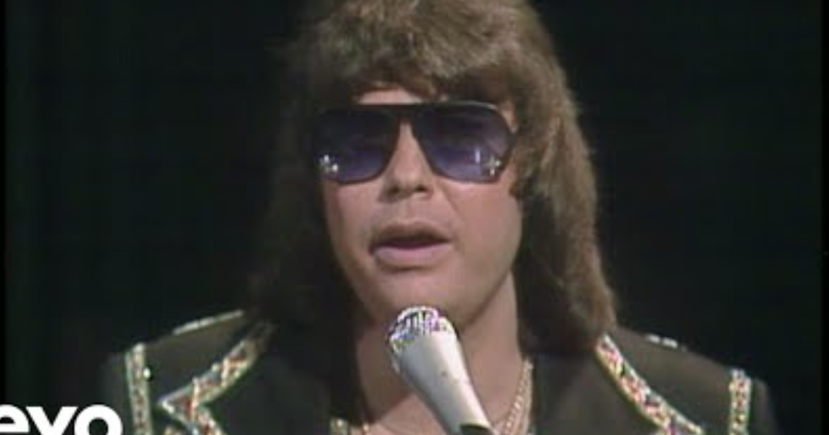 “Let’s Take the Long Way Around the World” – Ronnie Milsap (1978)